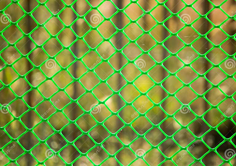 Green Grid on the Fence As a Background Stock Image - Image of fence ...