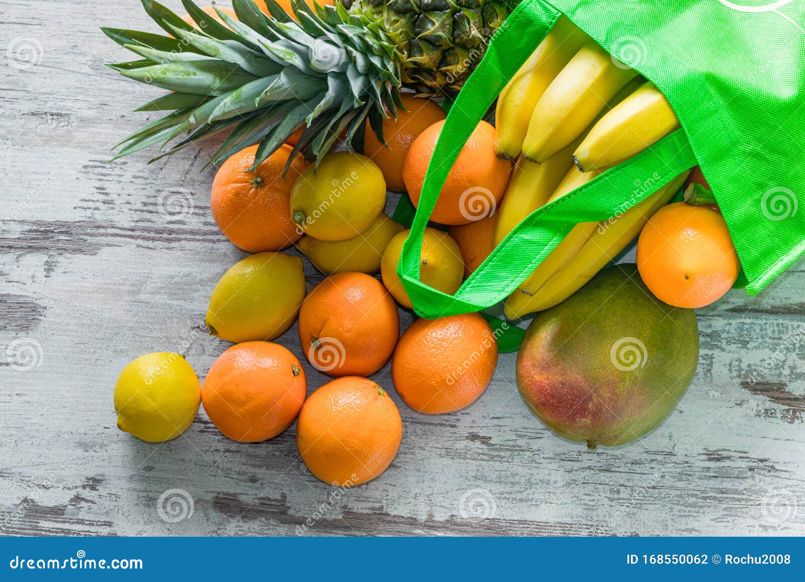 Green Grid with Healthy Fruit on the Kitchen Table Stock Photo - Image ...