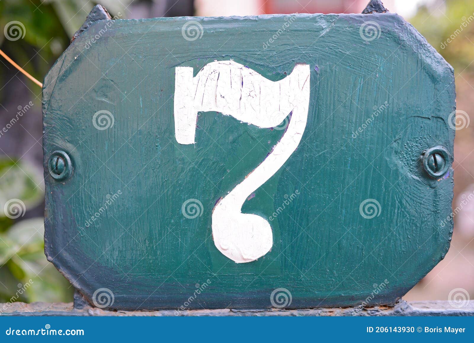 A Green House Number Plaque, Showing the Number Seven Stock Photo ...