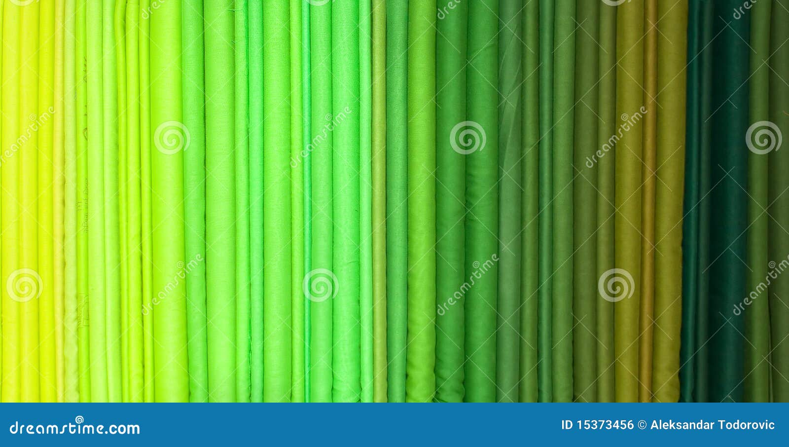 Green hue rolls of cloth stock photo. Image of macro - 15373456