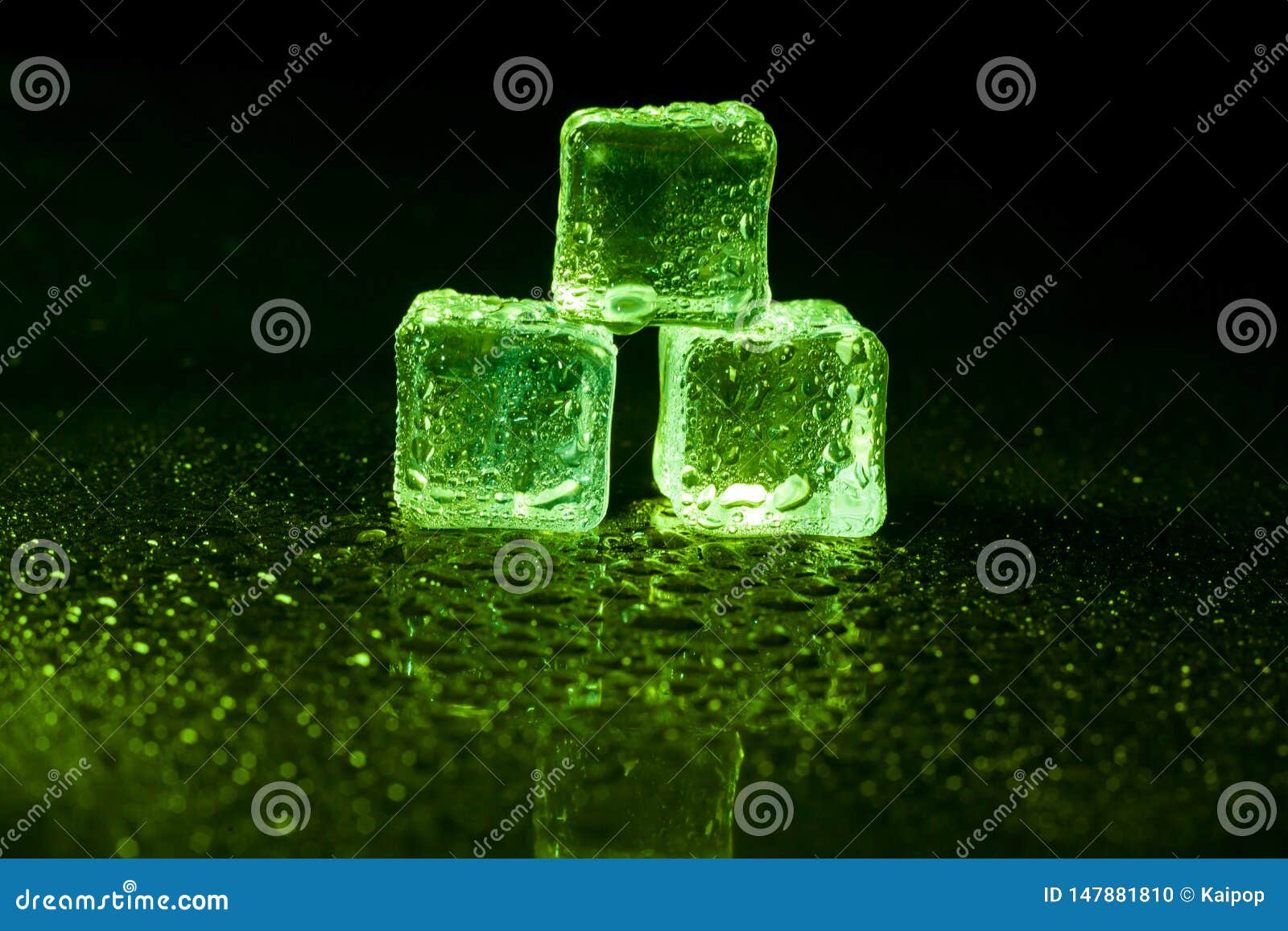Green Ice Cubes on Black Background Stock Photo - Image of green, macro ...