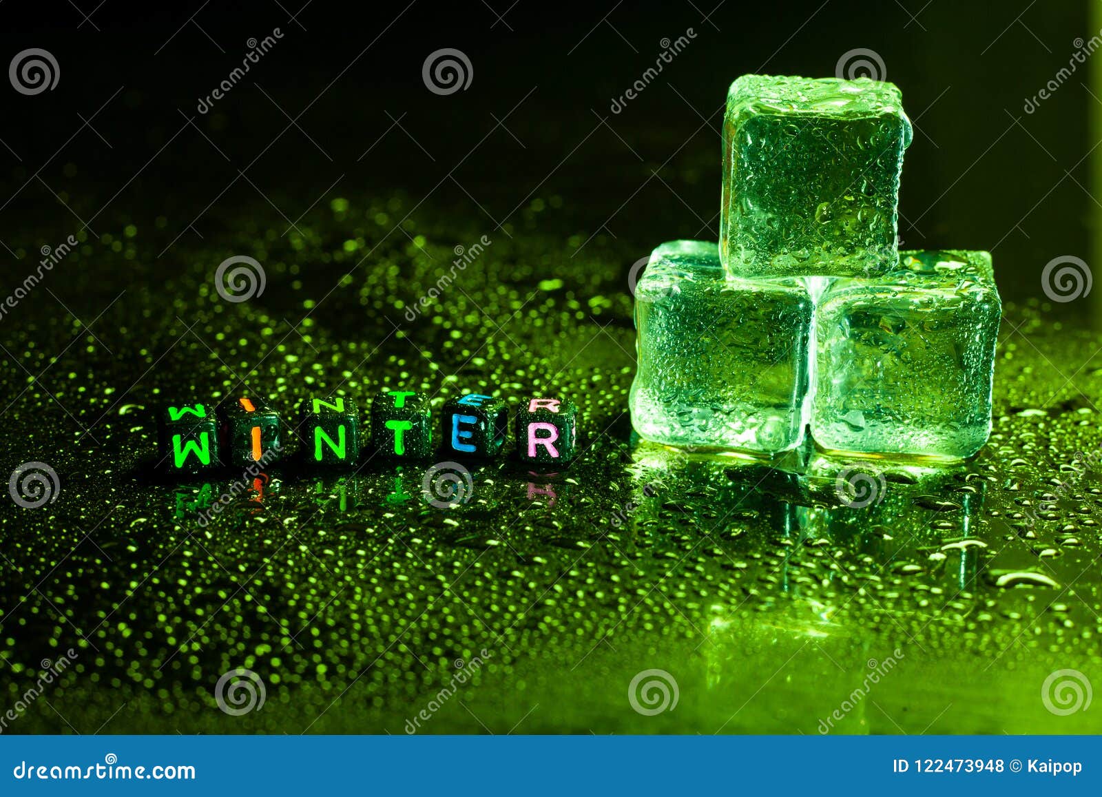 Green ice cubes. stock photo. Image of dark, beautiful - 122473948
