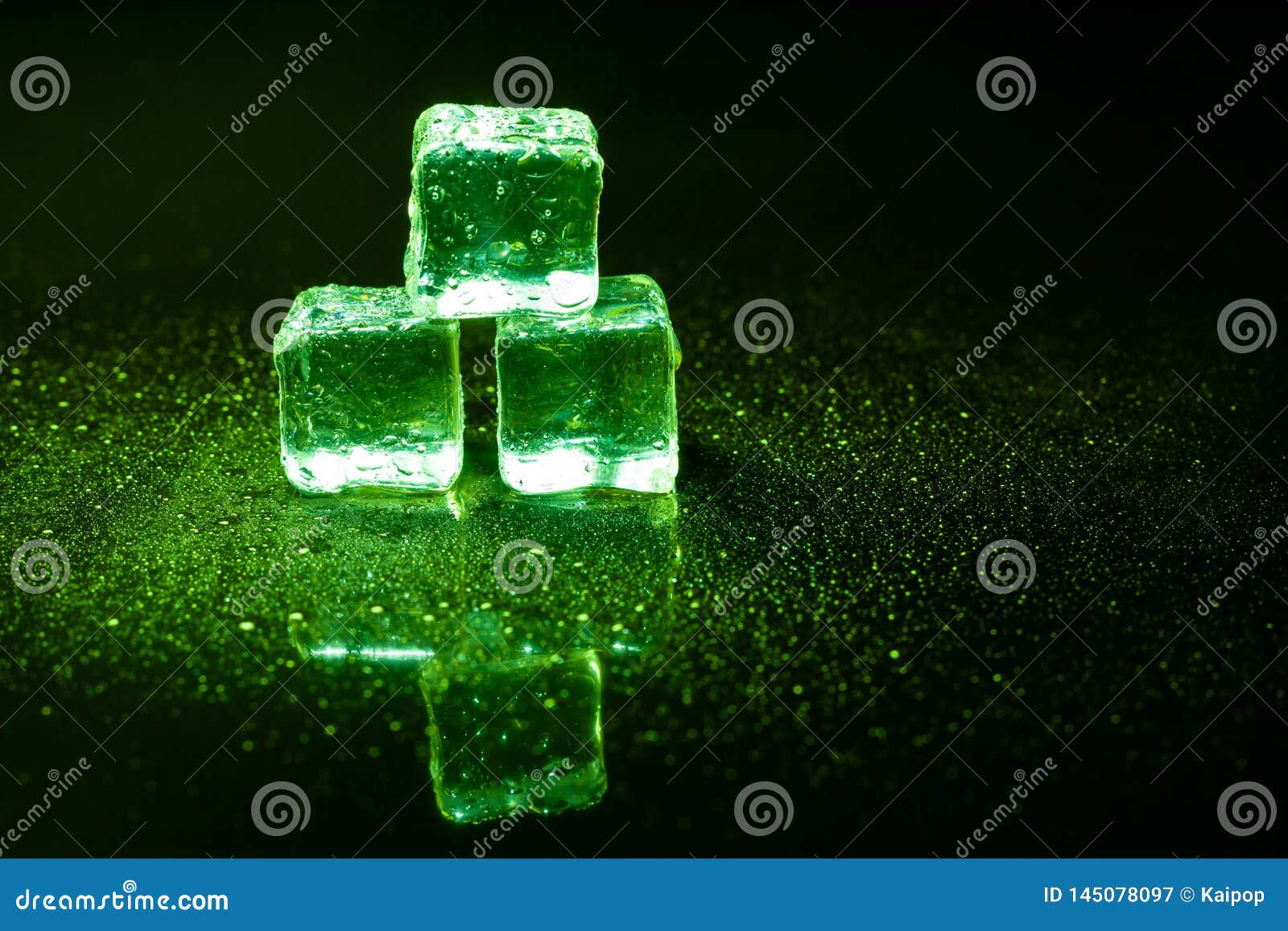 Green Ice Cubes Reflection on Black Table Stock Image - Image of cubes ...