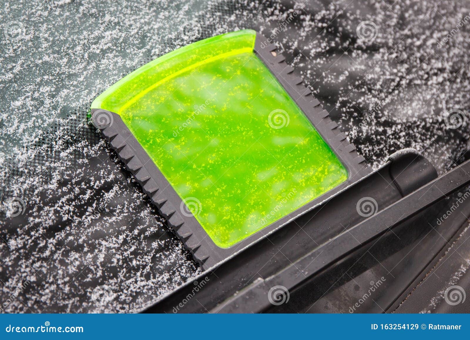 Green Ice Scraper on Car Windscreen, Winter Problems in Transportation ...