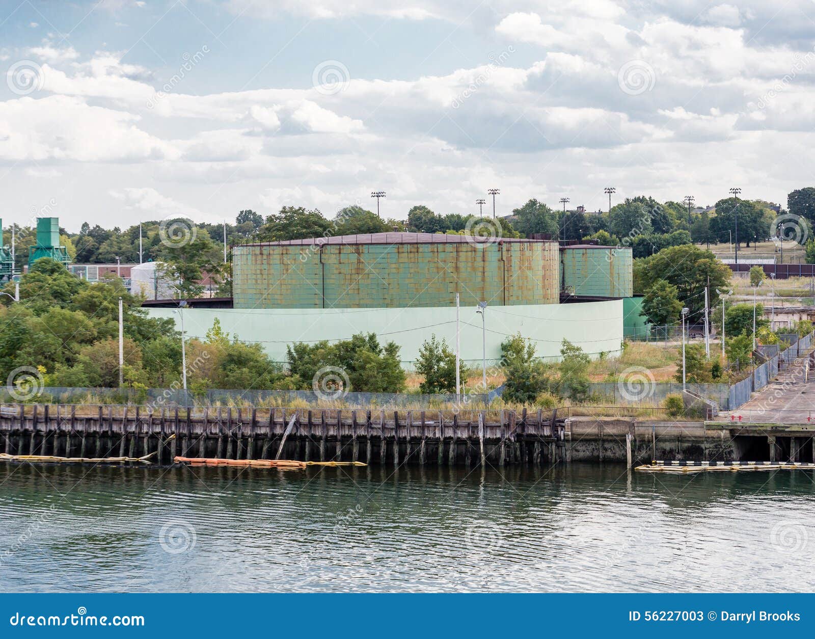 Green Industrial Tanks at Edge of Bay Stock Image - Image of petrol ...