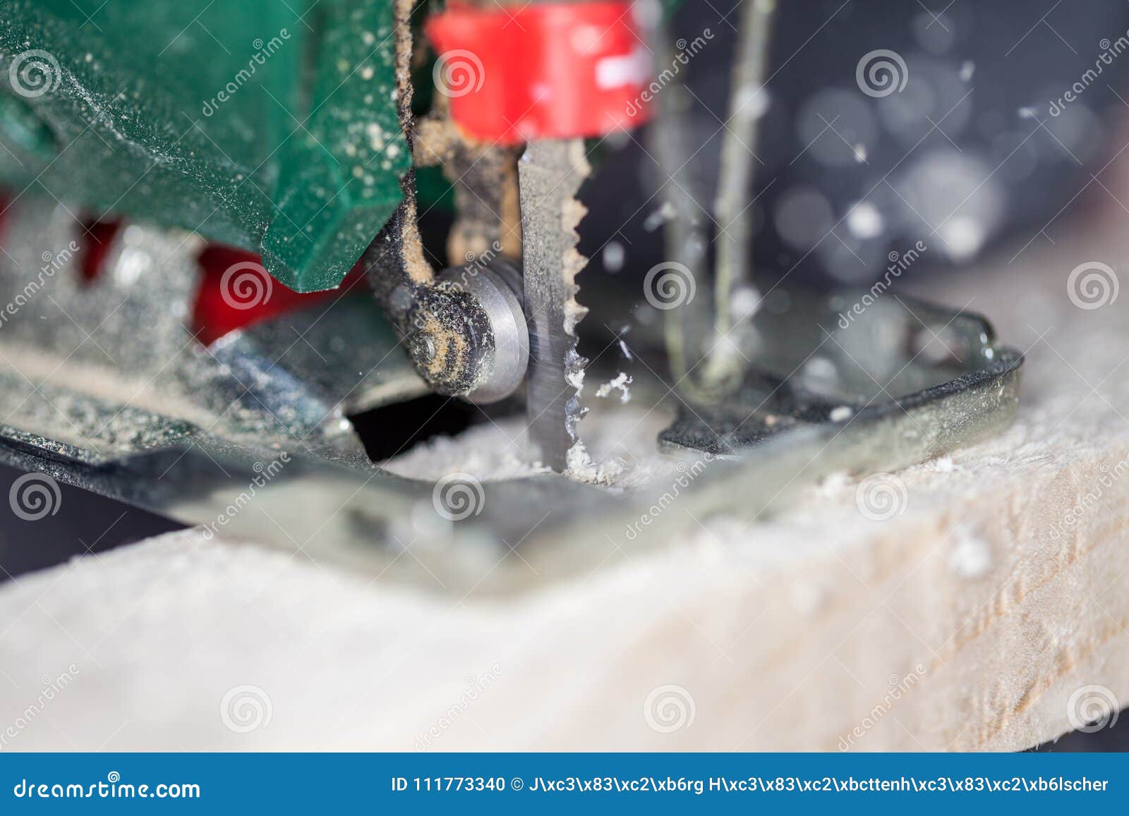 Green Jigsaw Saws a Bright Plank Stock Photo - Image of close, blade ...