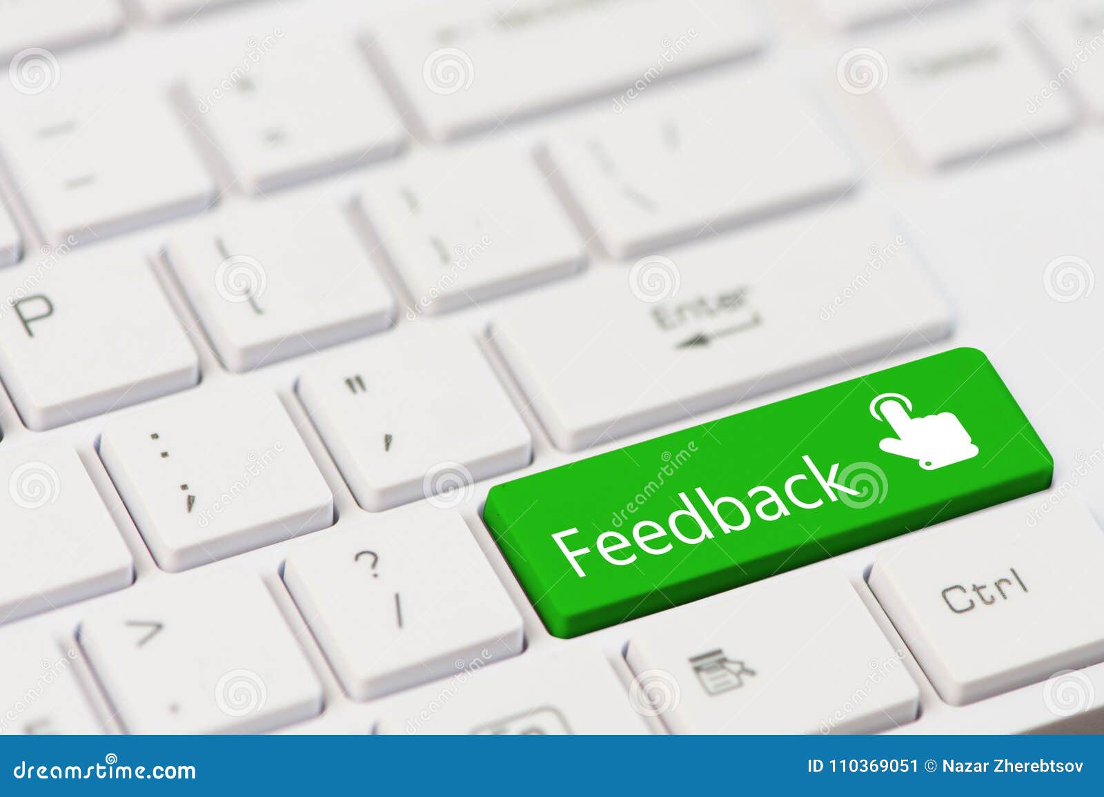 Green Key with Text Feedback and Touch Finger Icon on White Laptop ...