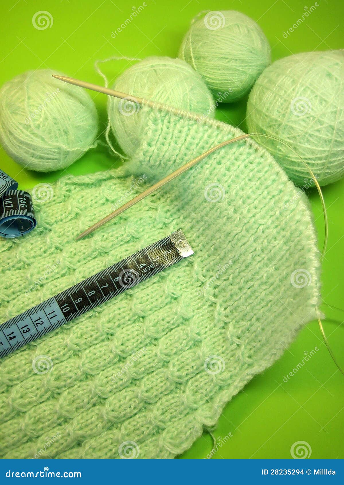 Green knitting stock photo. Image of centimetre, wall - 28235294