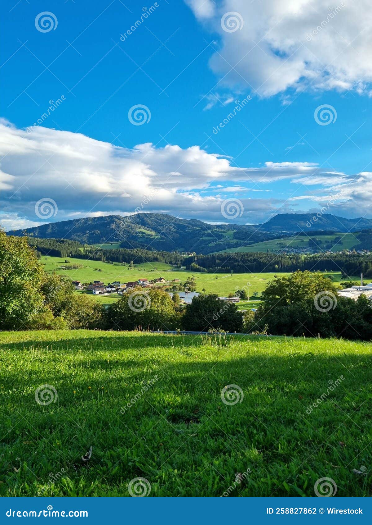 Green Landscape in a Mountain Town Stock Photo - Image of grass, hill ...