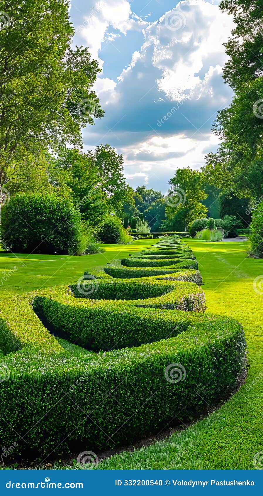 A Green Lawn with Hedges in the Middle of it Stock Photo - Image of ...