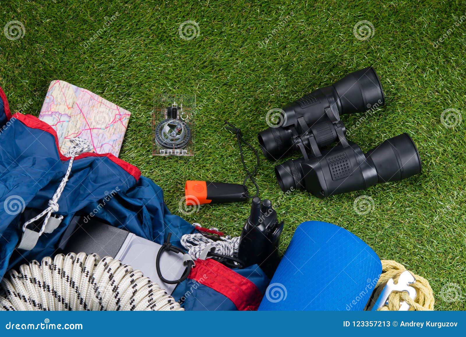 On the Green Lawn, a Set of Objects for Tourism, Binoculars, Flashlight ...