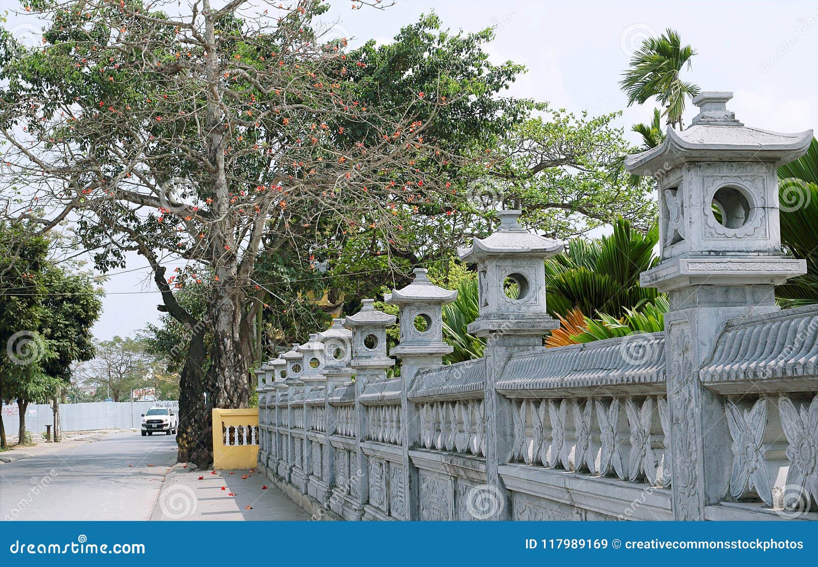 Green-leafed Tree Beside Gray Concrete Baluster Picture. Image: 117989169
