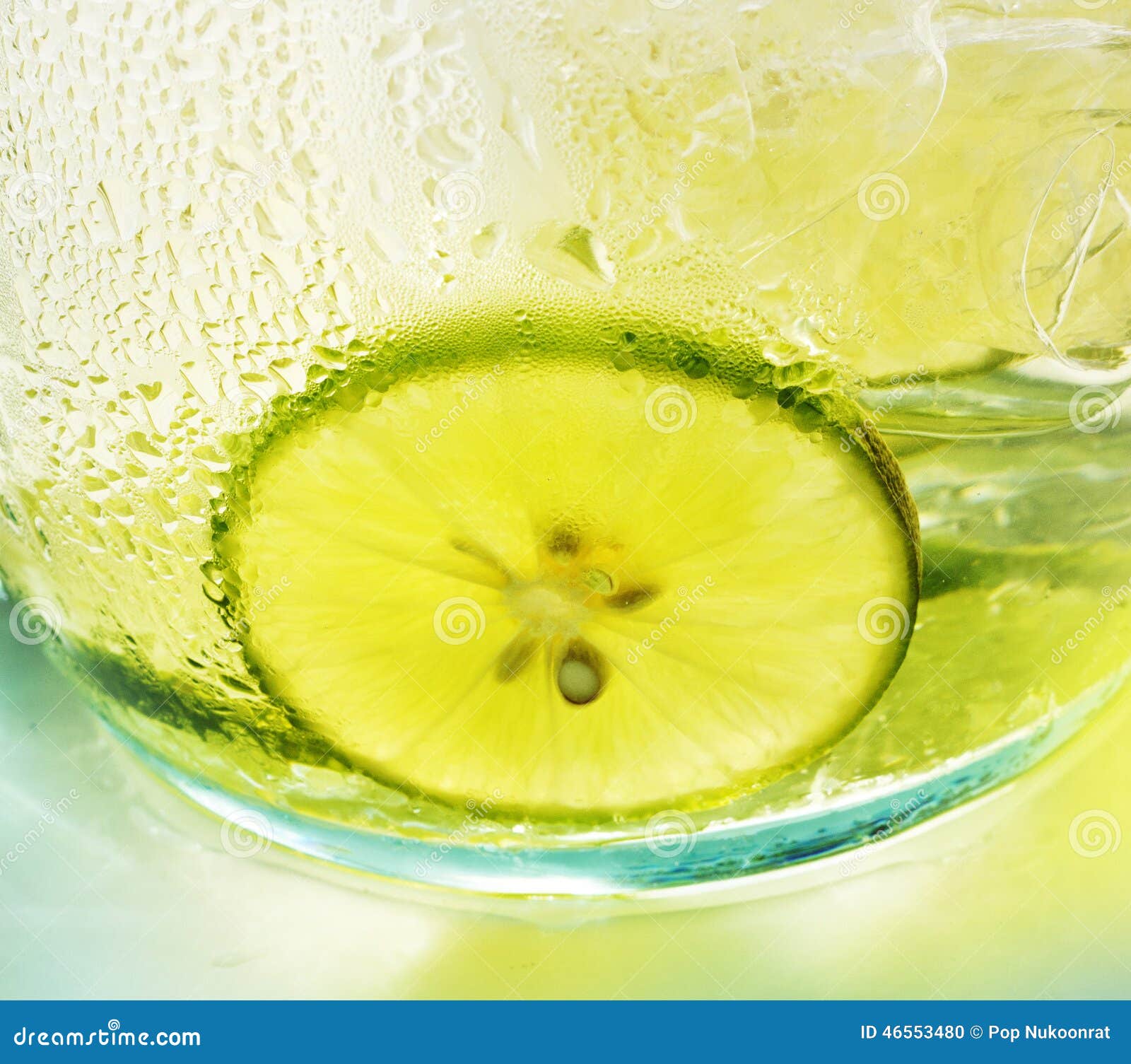 Green Lemon with Ice Tea - Bright Colors Stock Photo - Image of slice ...