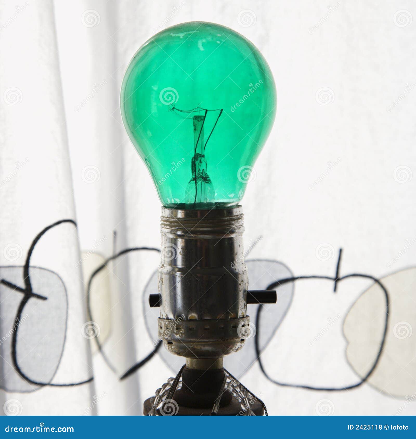 Green light bulb. stock photo. Image of indoors, photograph - 2425118