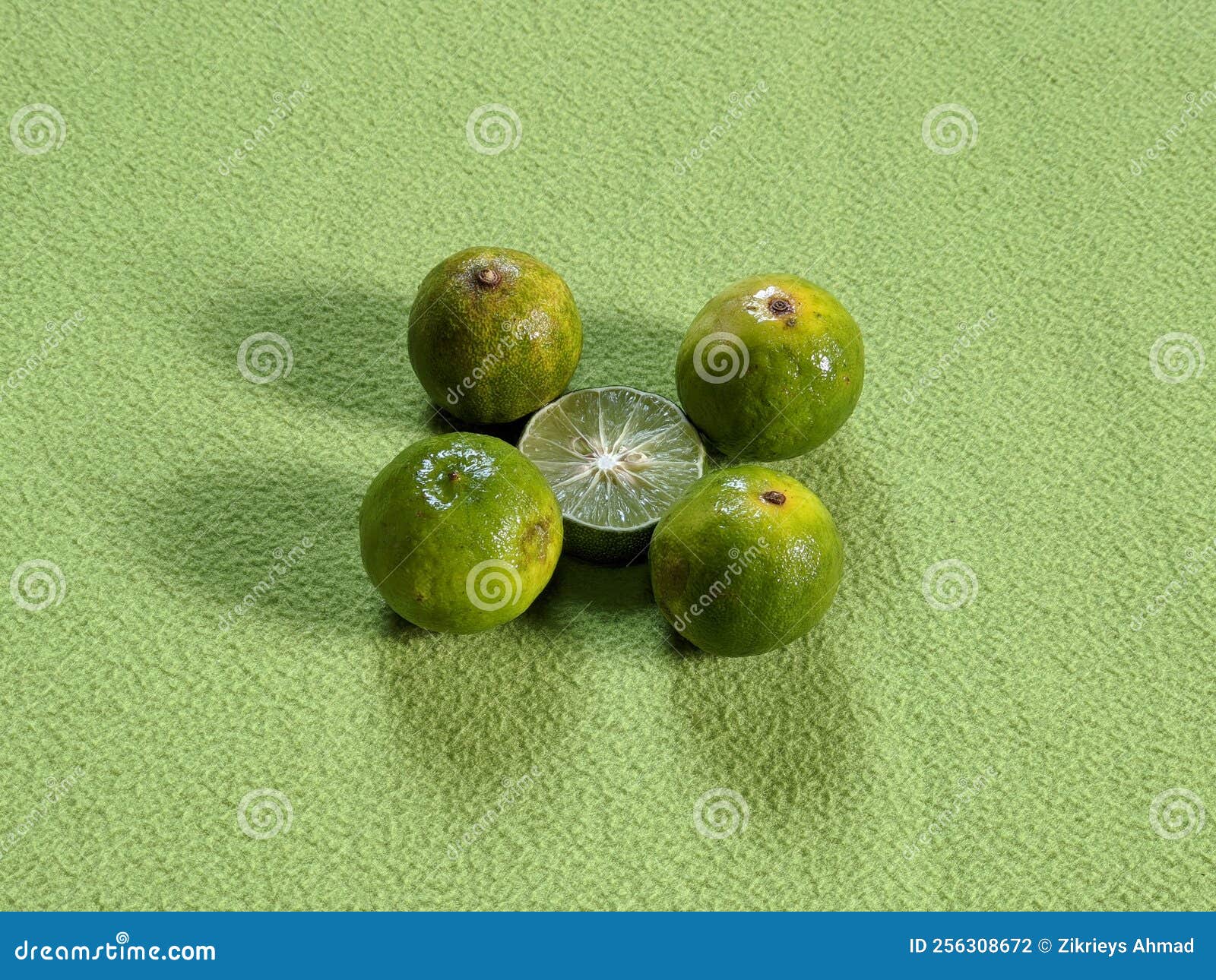 Green Limes Fruit on Green Background Stock Photo - Image of citrus ...