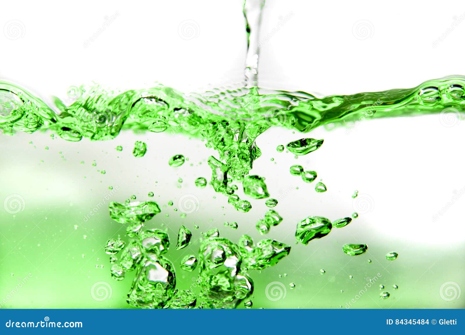 Green Lit Water Splash with Bubbles Stock Photo - Image of surface ...