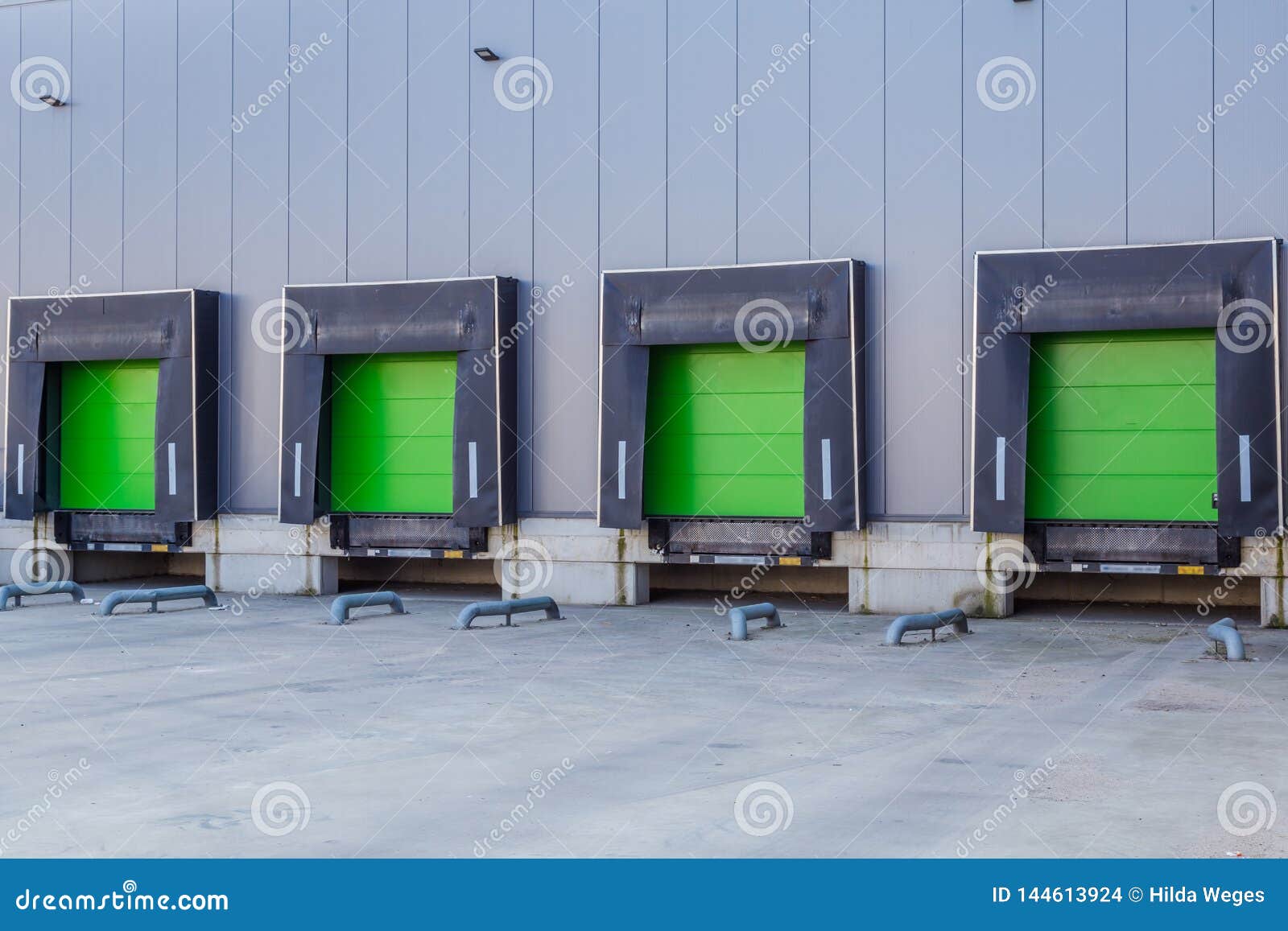 Green Loading Ramp Doors at Distribution Center Stock Photo - Image of ... Green Loading Ramp Doors at Distribution Center Stock Photo - Image of ...