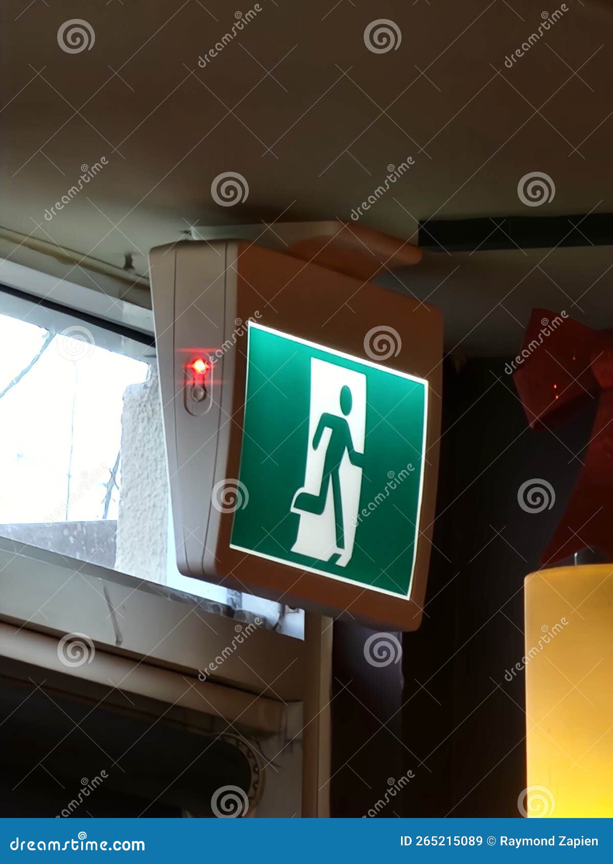 Green Man Running Exit Sign Above Restaurant Doorway Stock Image ...