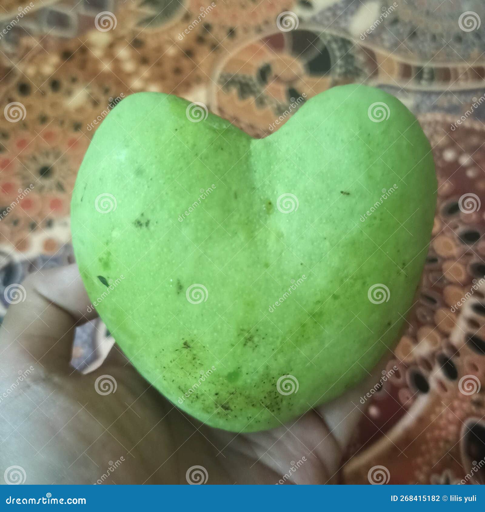 A Green Mango with a Heart Shape Stock Photo - Image of shapes ...