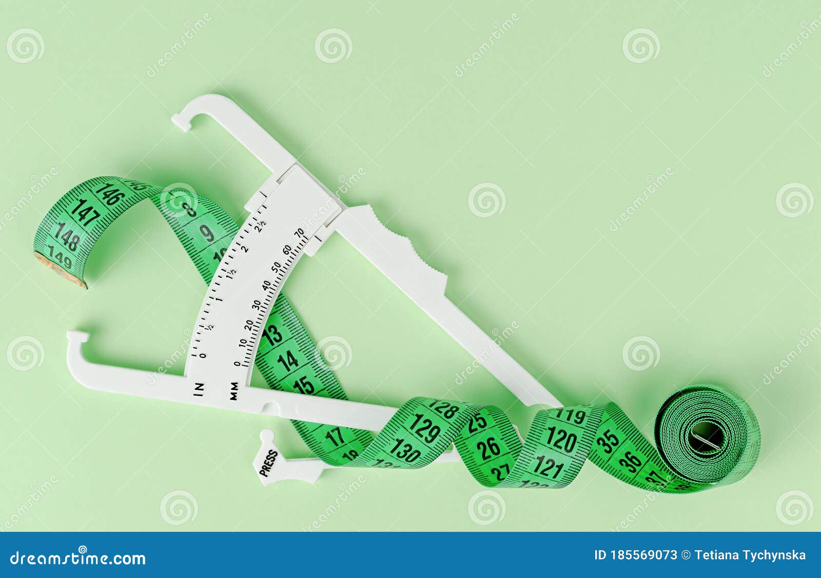 Green Measuring Tape and White Caliper. Stock Image - Image of diet ...
