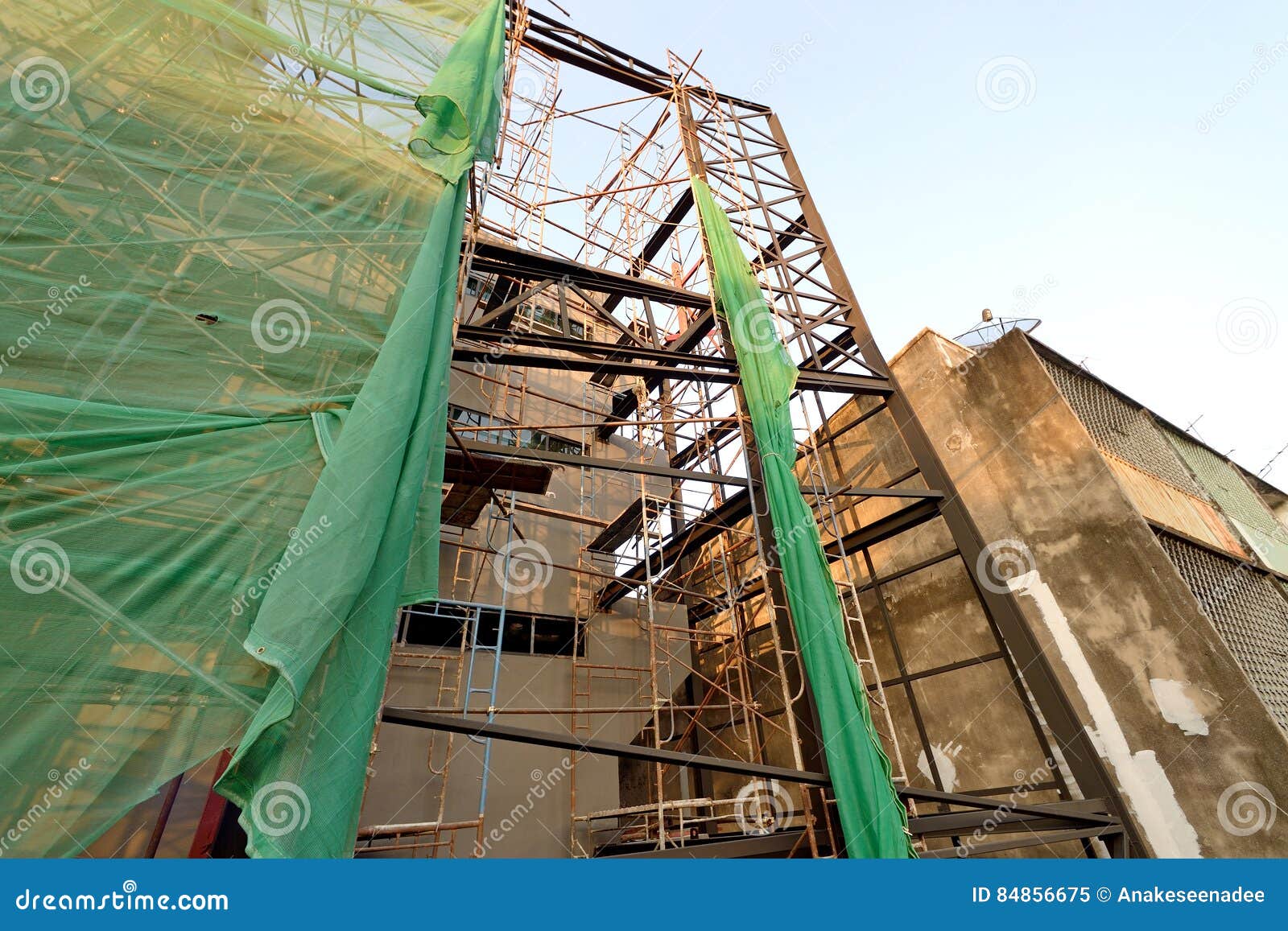 Green Mesh Construction stock image. Image of construction - 84856675