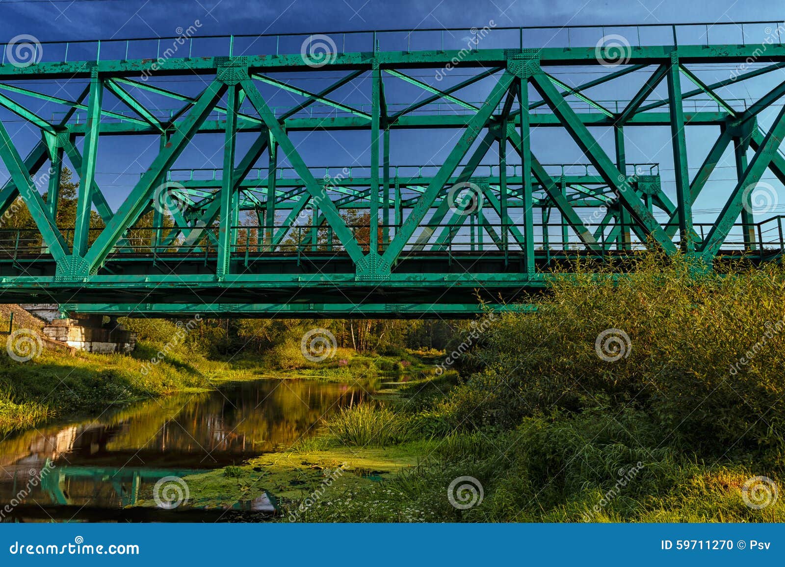 Green metal railway bridge stock photo. Image of water - 59711270