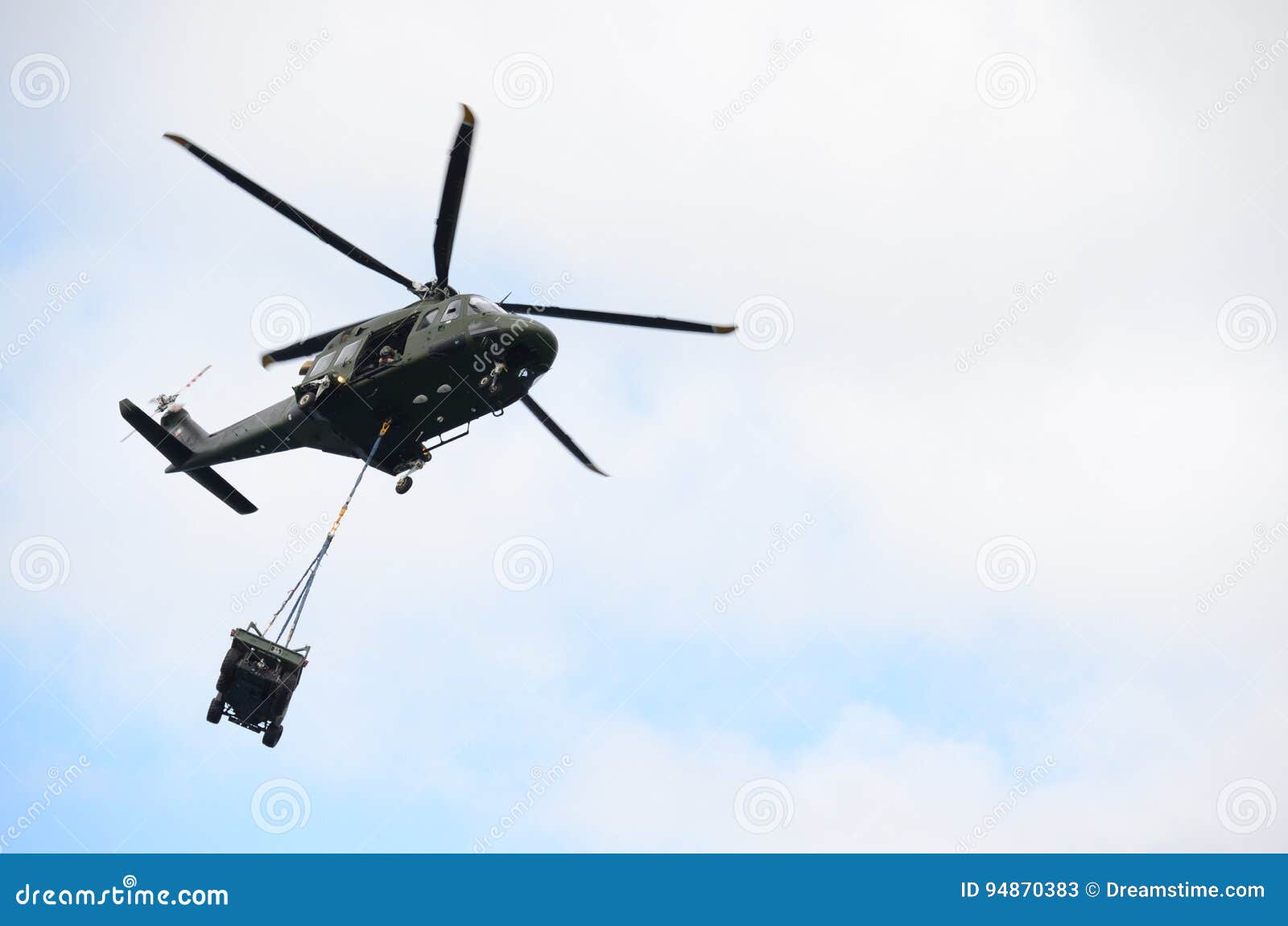 Green Military Helicopter Carrying a Jeep Stock Image - Image of engine ...