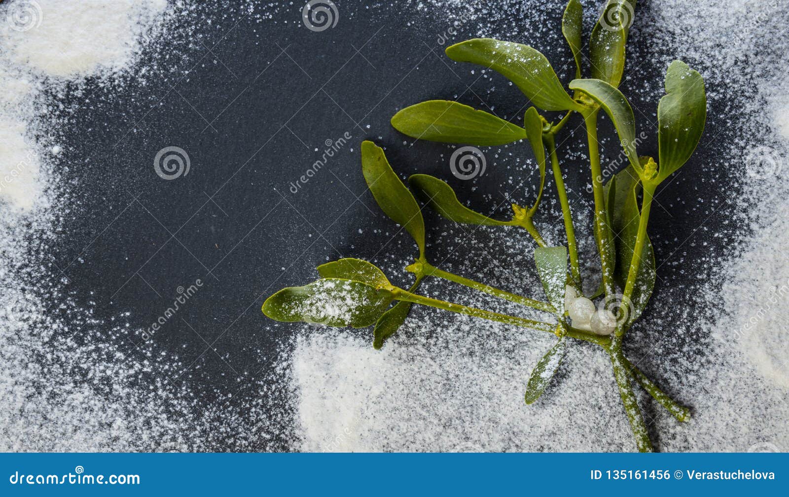 Green mistletoe on a board stock photo. Image of hanging - 135161456
