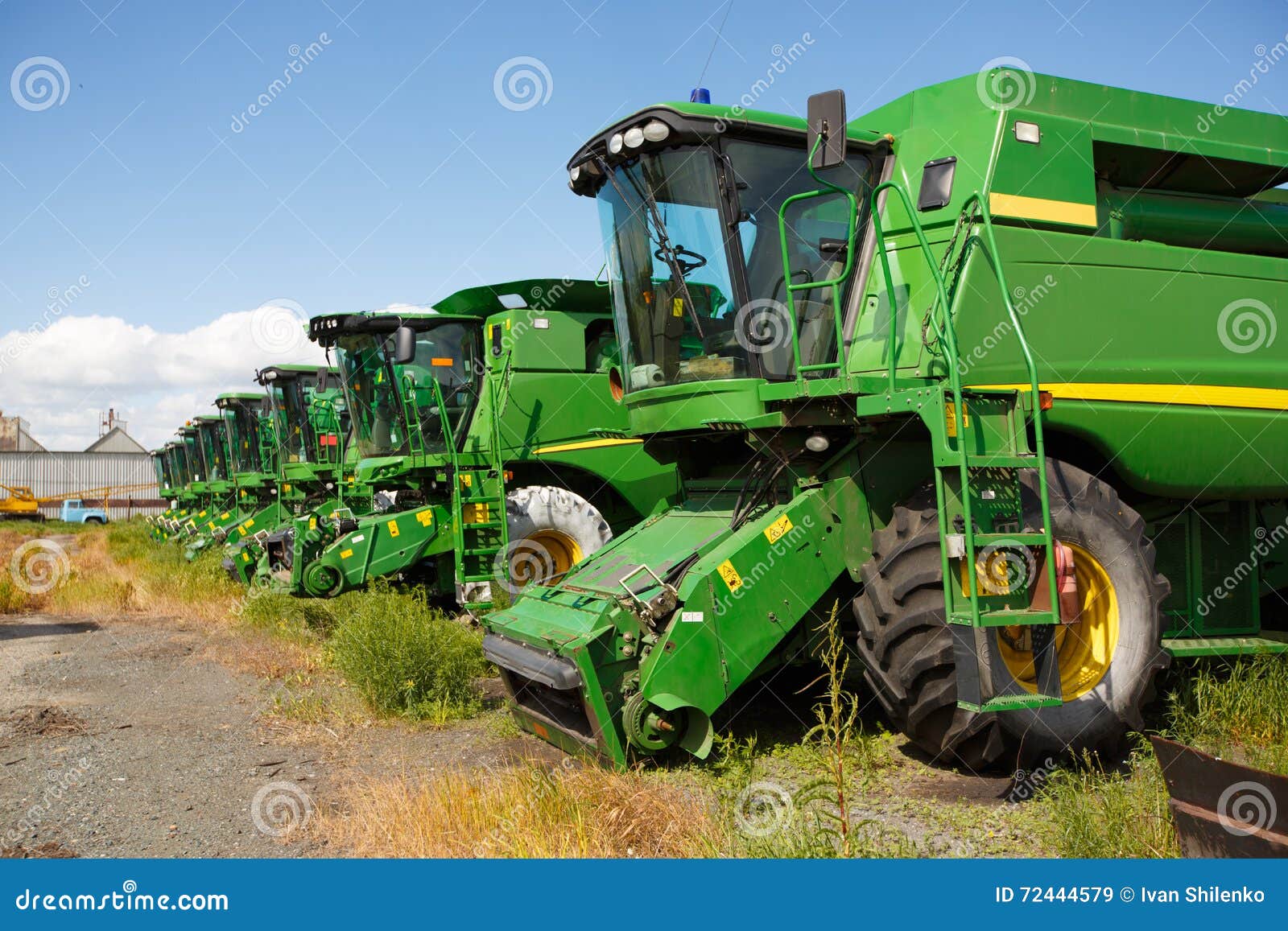 Green Modern Combine Harvester on Stubble Field at End of Summer ...
