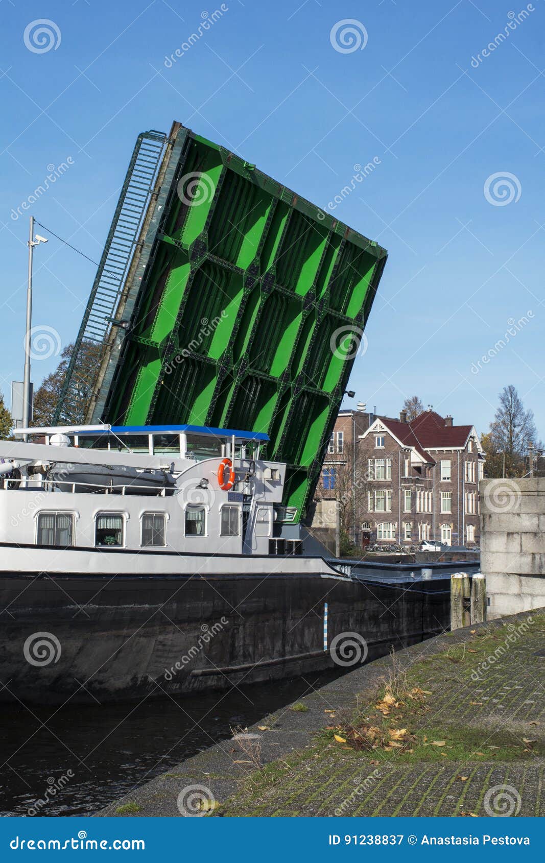 Green Modern Drawbridge with Big Boat Under it Stock Image - Image of ...