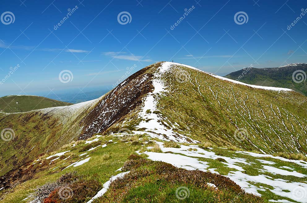 Green Mountain Ridge with Snowfields of the Spring Pyrenees Stock Photo ...