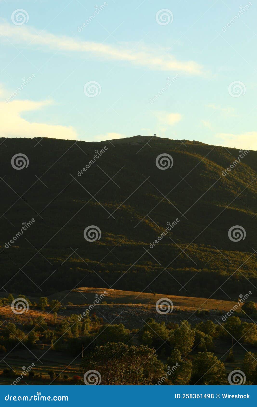 A Green Mountain during the Sunset Stock Photo - Image of landscape ...