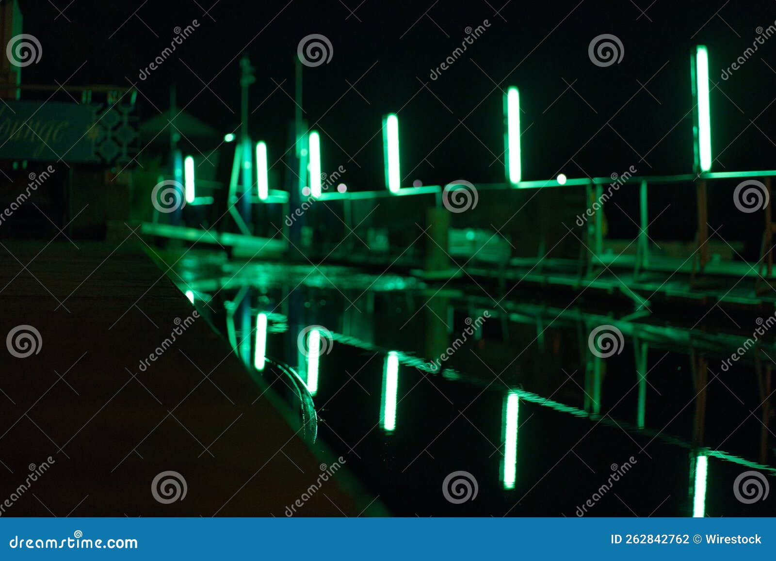 Green Neon Lights Reflecting in the Water Stock Photo - Image of modern ...