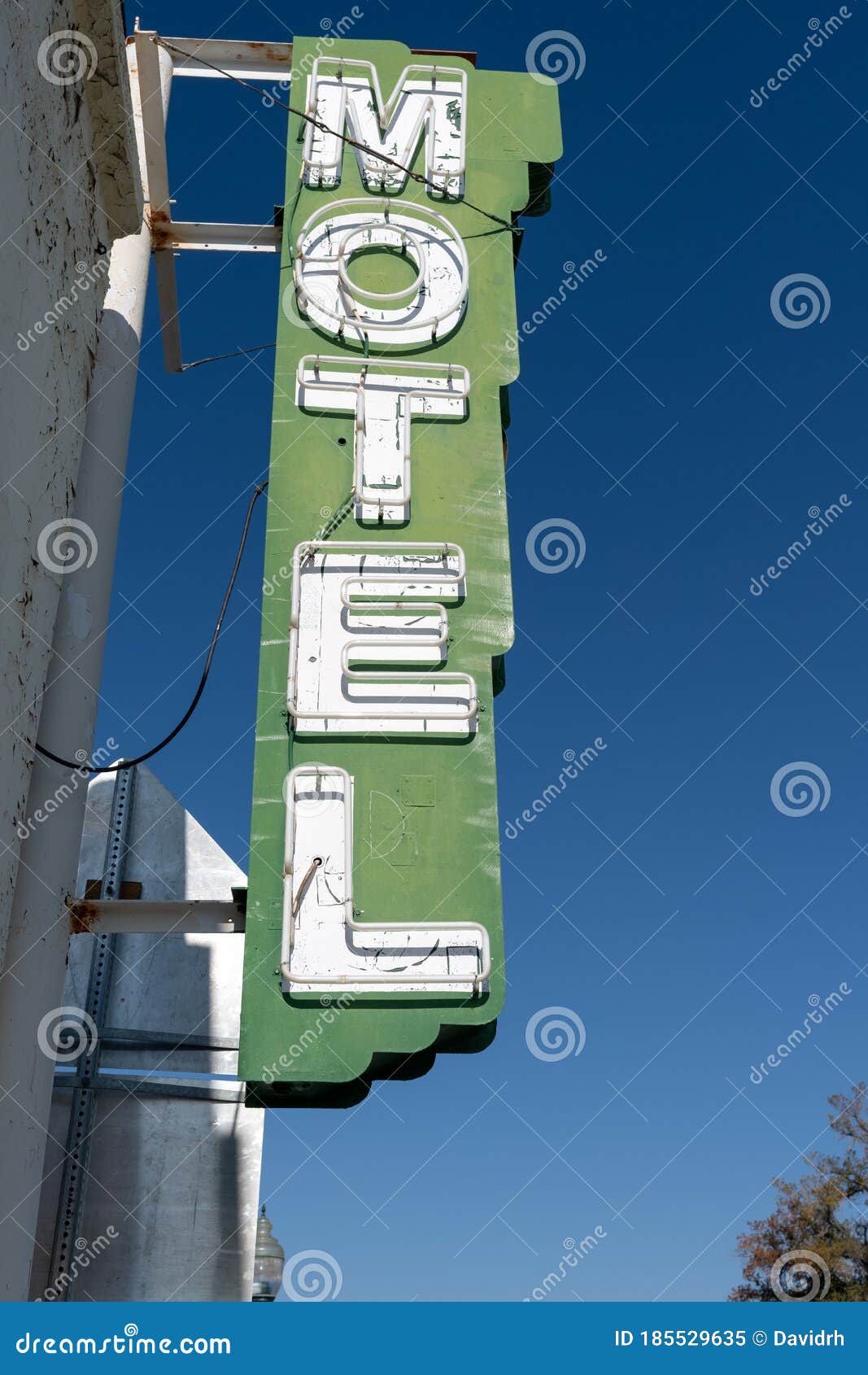 Green Neon Motel Sign in Daylight Stock Image - Image of street ...
