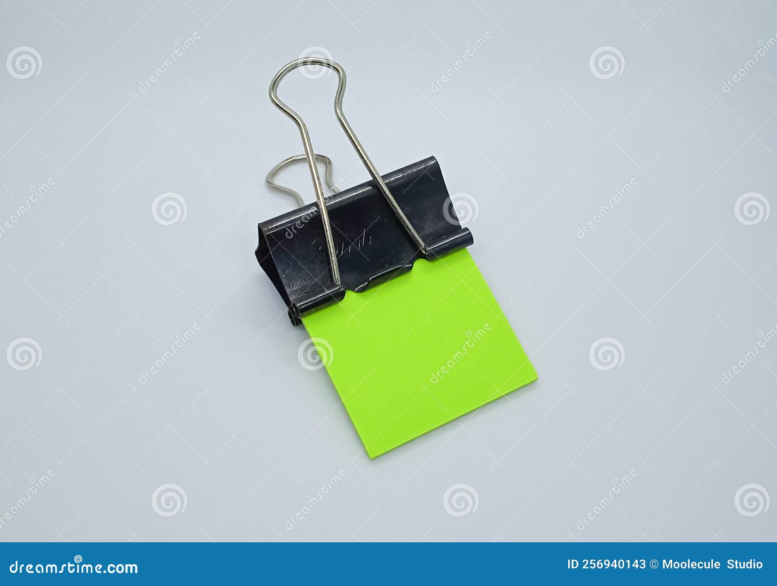 Green Note Paper with Black Binder Clip. Binder Clip and Stack of Green ...