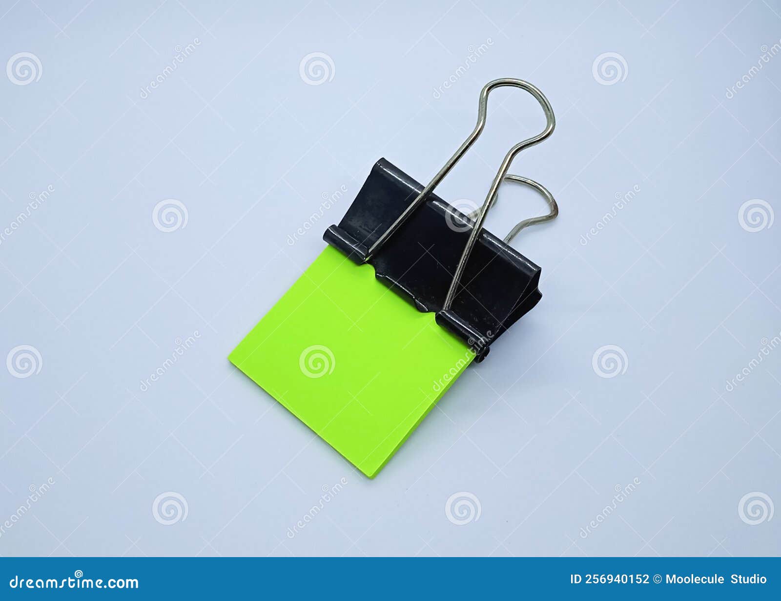 Green Note Paper with Black Binder Clip. Binder Clip and Stack of Green ...
