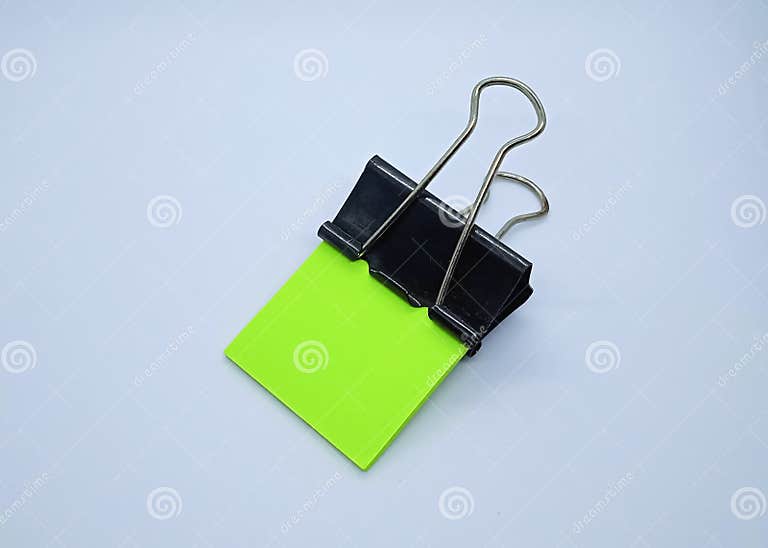 Green Note Paper with Black Binder Clip. Binder Clip and Stack of Green ...