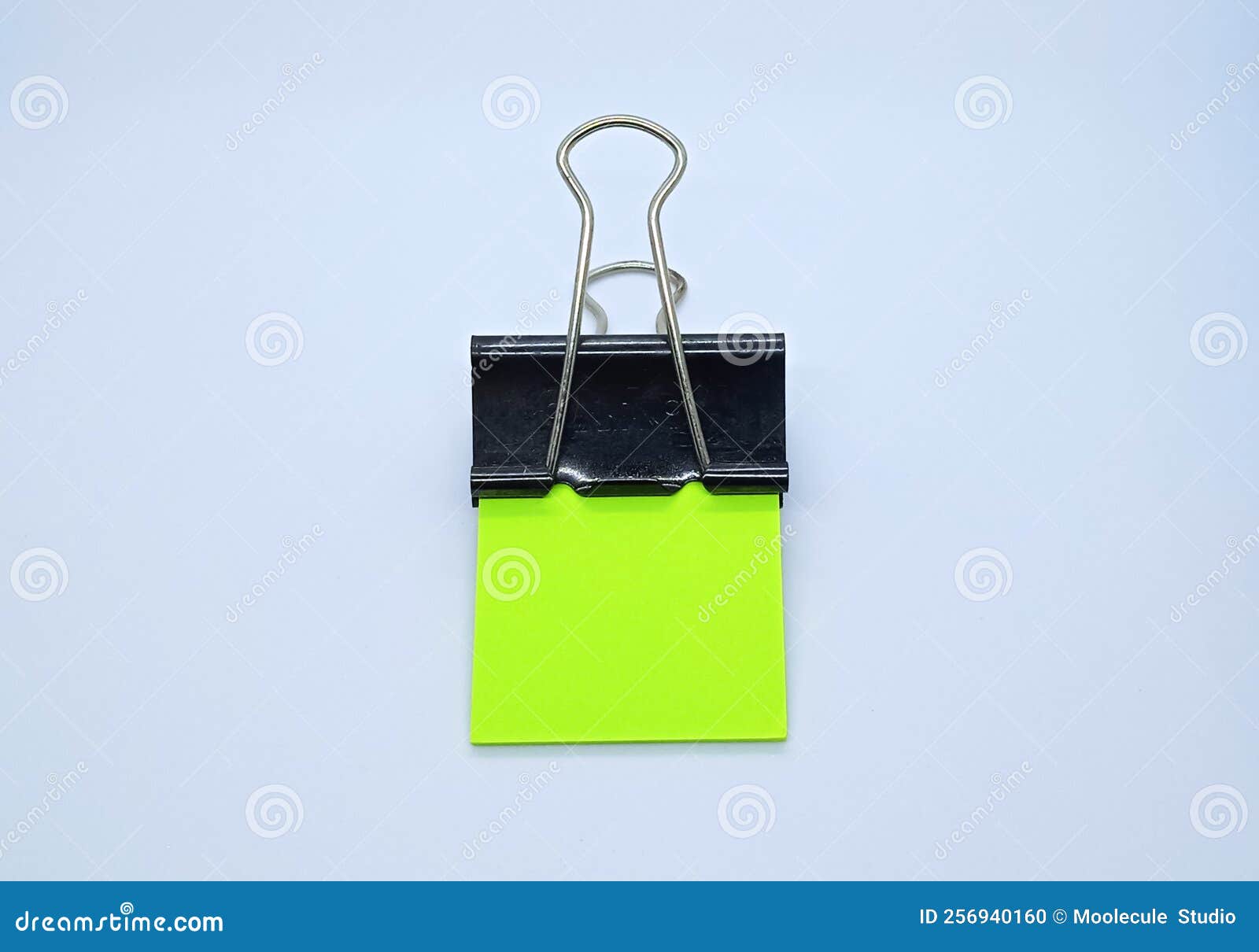 Green Note Paper with Black Binder Clip. Binder Clip and Stack of Green ...