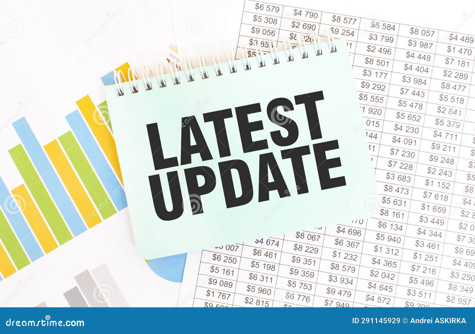 Green Notepad on Financial Documentation. Text LATEST UPDATE Stock ...