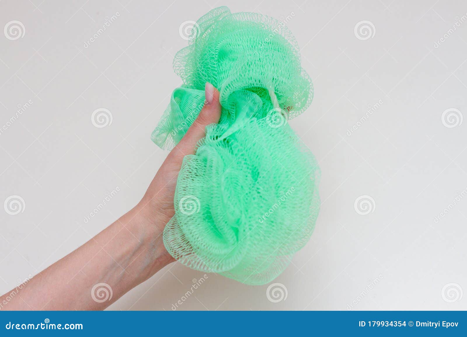Green Nylon Washcloth in a Female Hand Stock Photo - Image of nylon ...