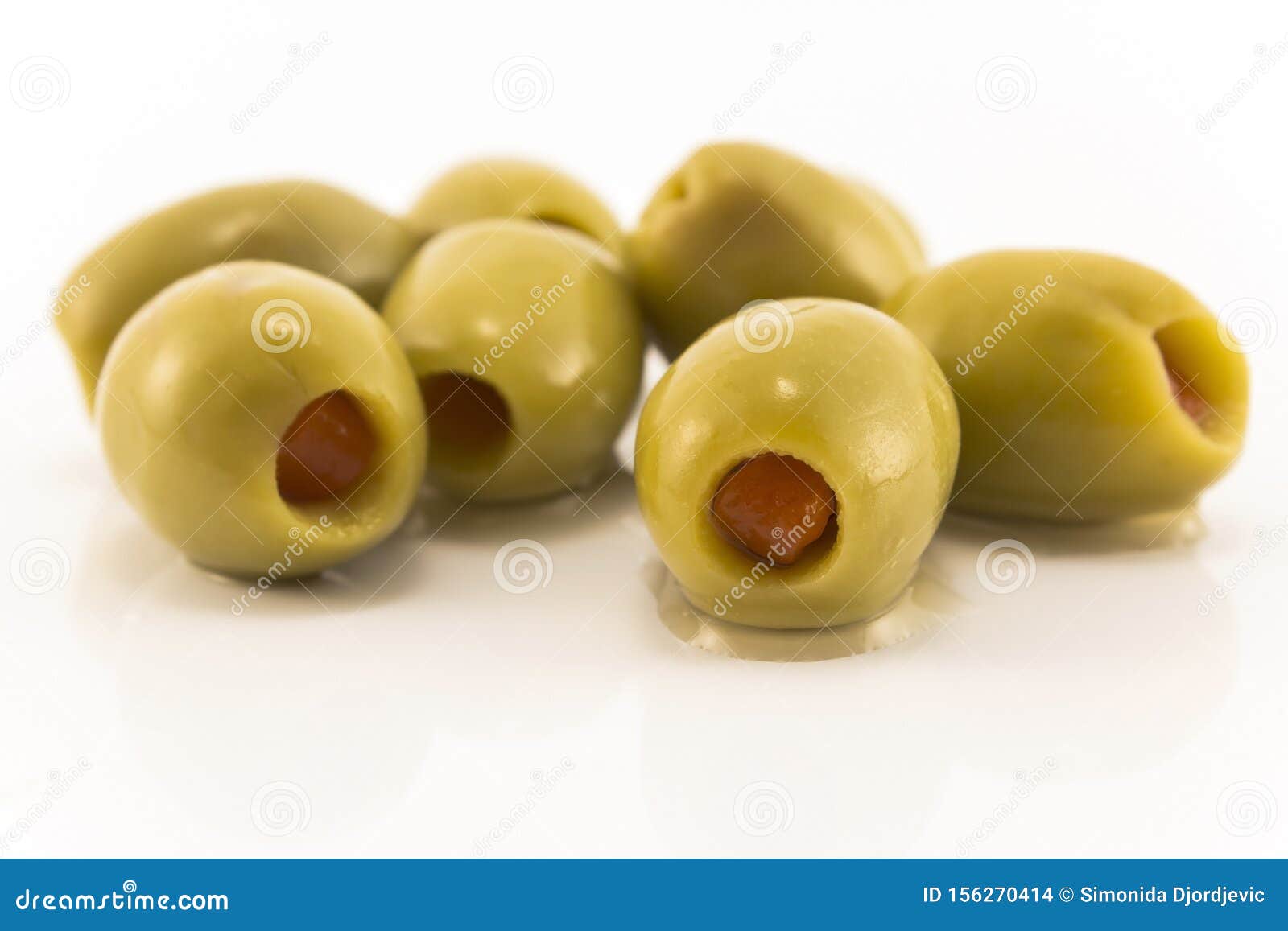 Green Olives Stuffed with Peppers, Isolated on White Stock Photo ...