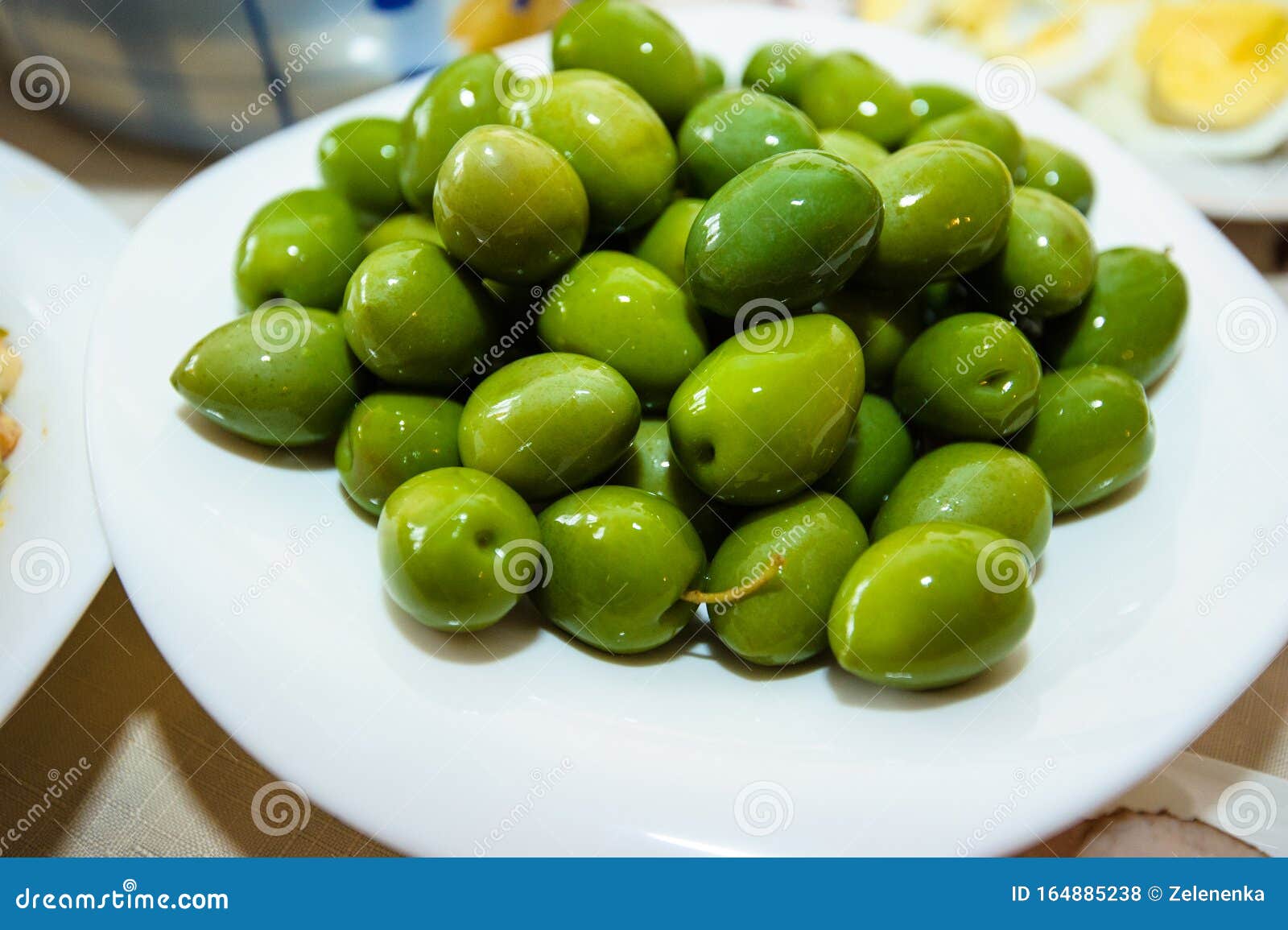 Green Olives on a White Plate Stock Photo - Image of ingredient, olive ...