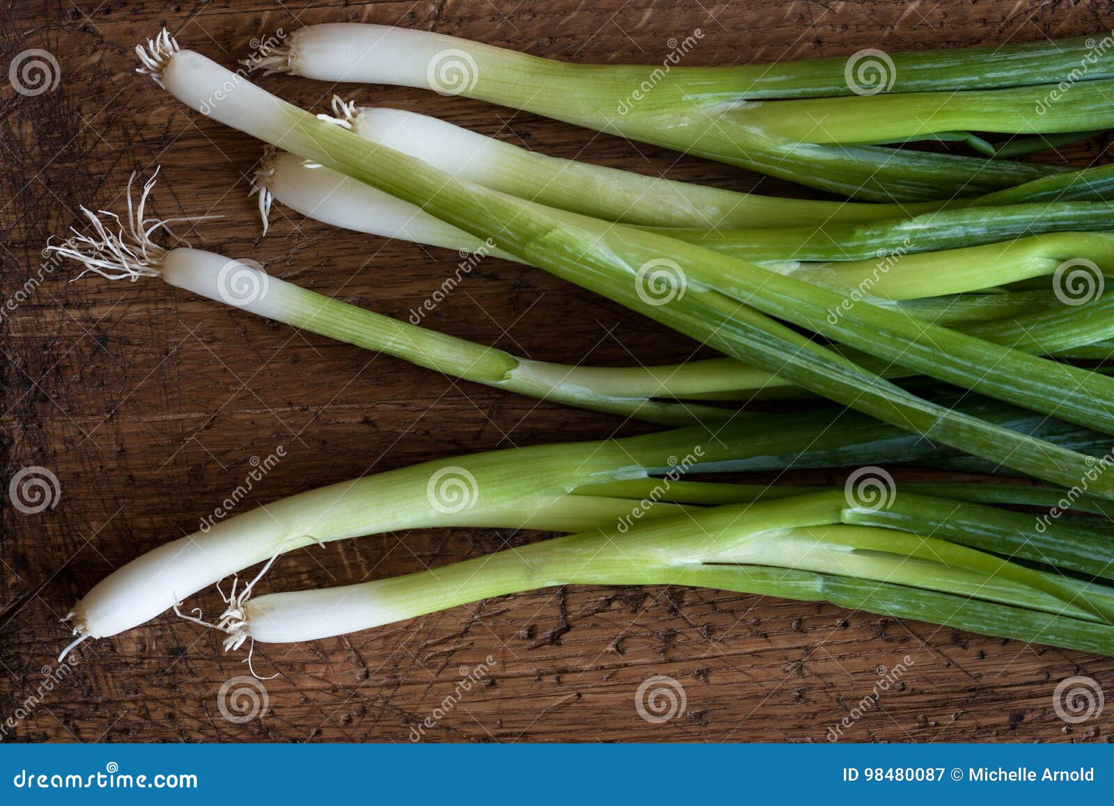 Fresh Green Onions Stalks on a Cutting Board Stock Image - Image of ...