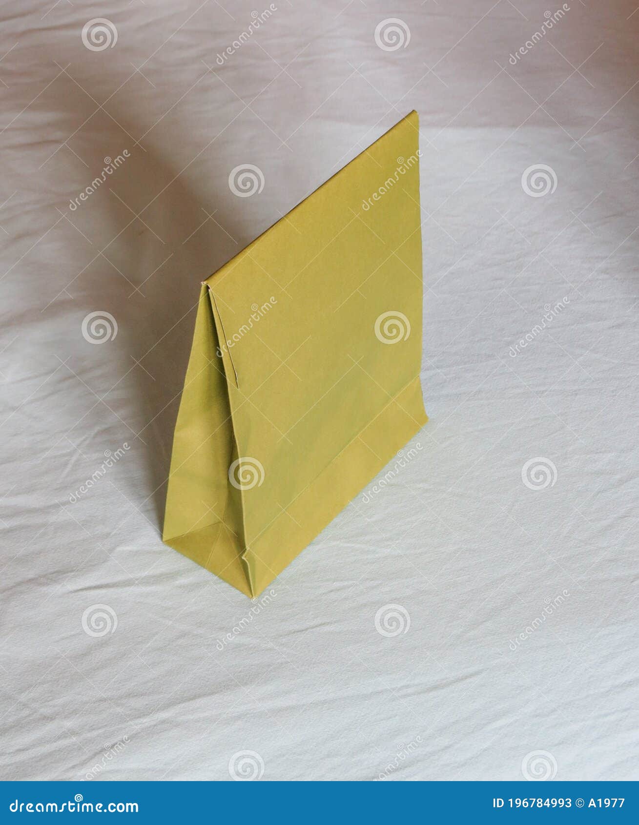 A green paper packet stock image. Image of product, fashion - 196784993