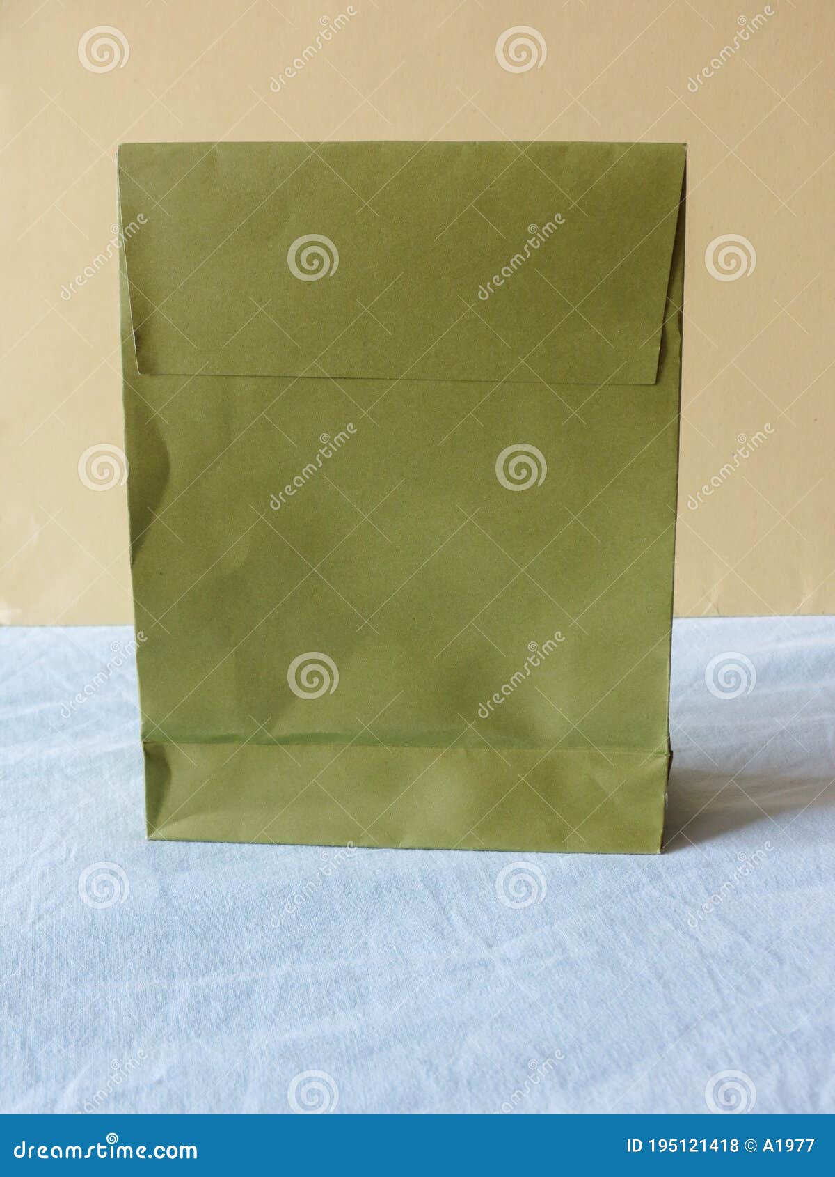 A green paper packet stock photo. Image of beauty, product - 195121418