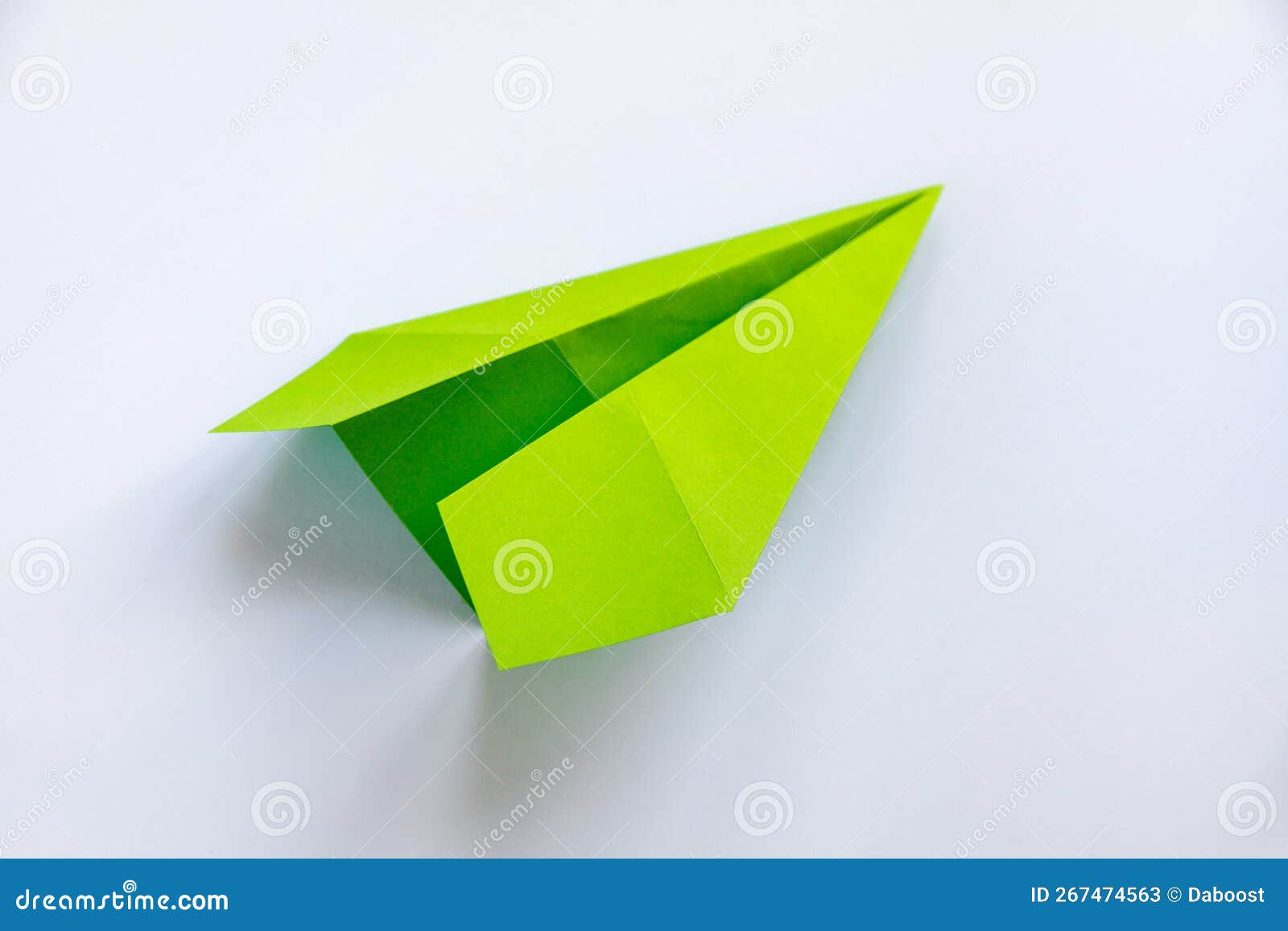 Green Paper Plane Origami Isolated on a White Background Stock Image ...