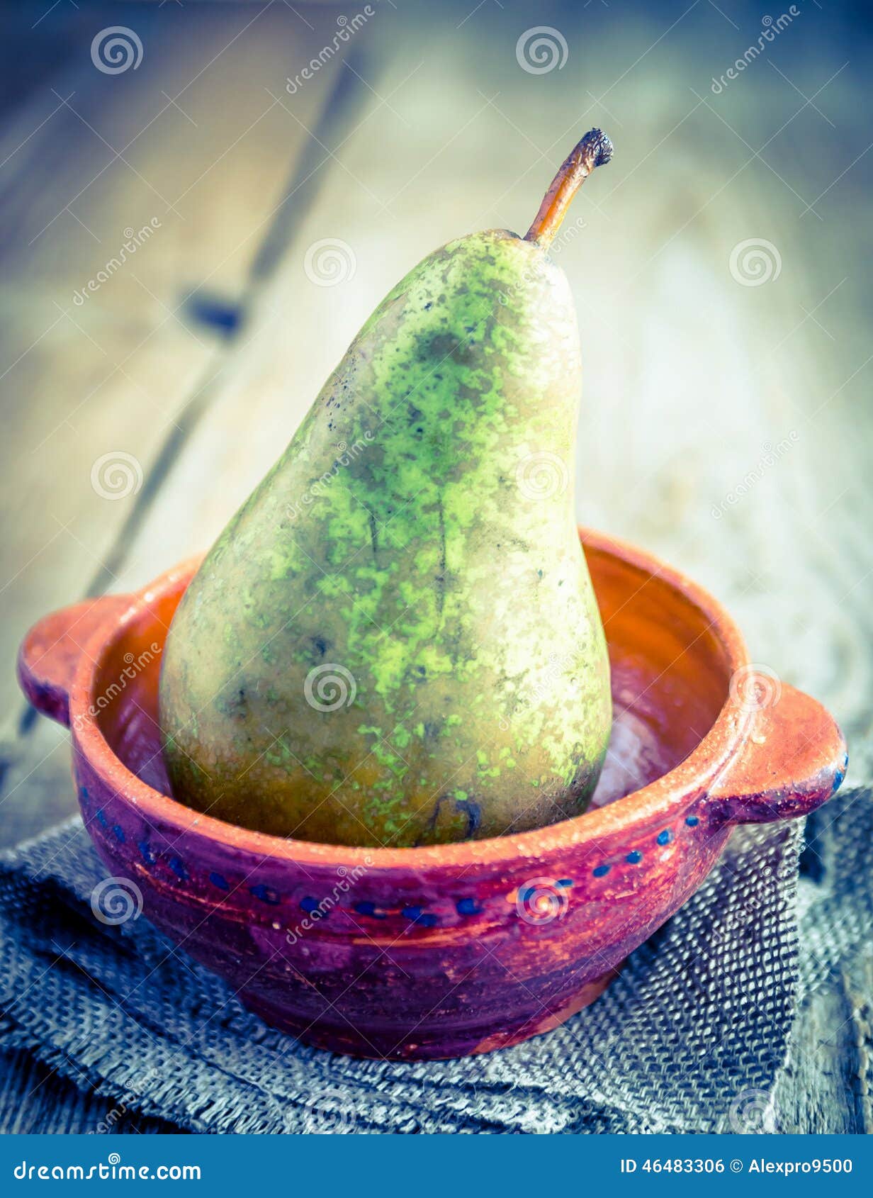 Green pear in rustic decor stock photo. Image of green - 46483306