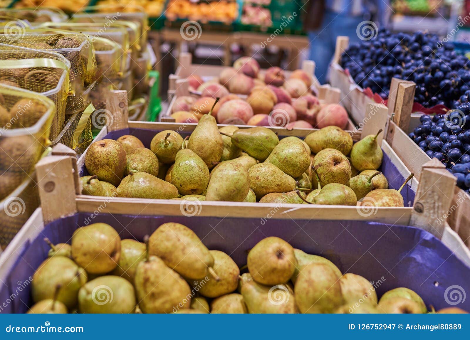 Green pear in the store stock image. Image of group - 126752947