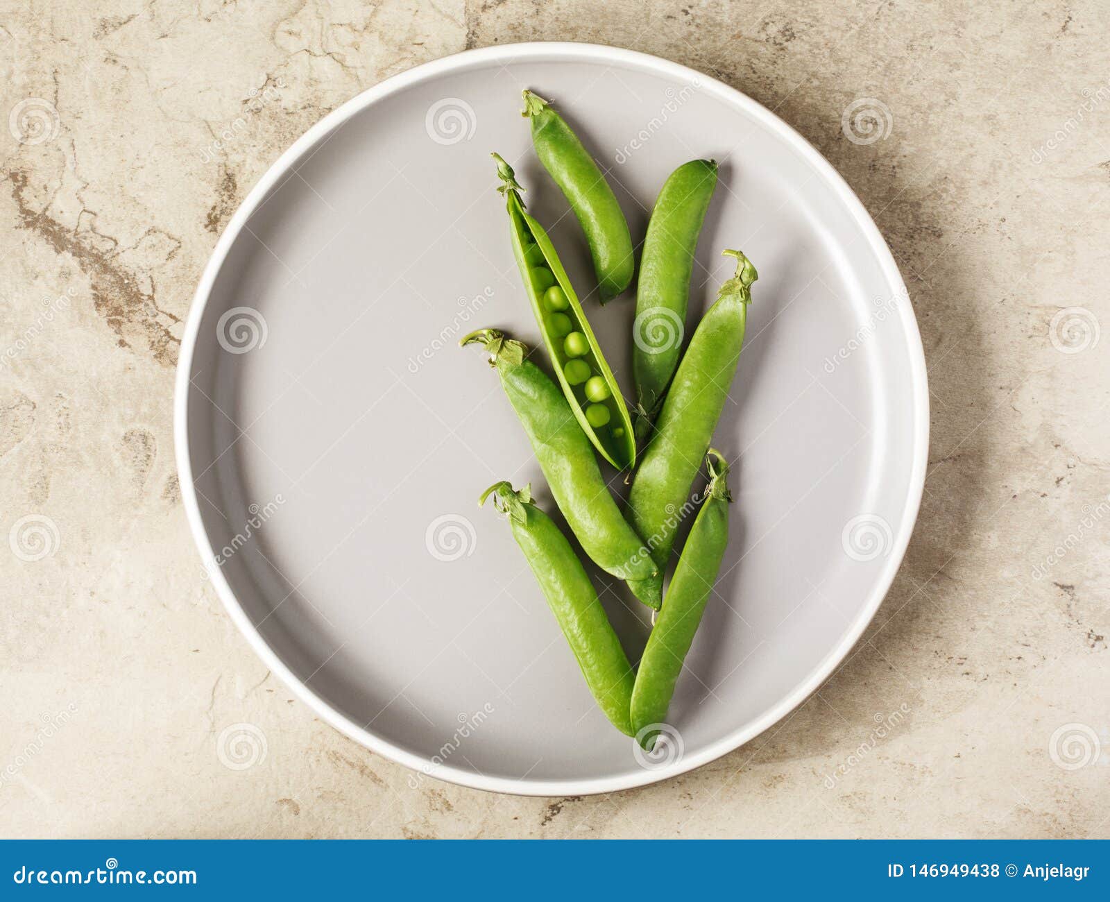 Green peas on plate stock photo. Image of vegetables - 146949438