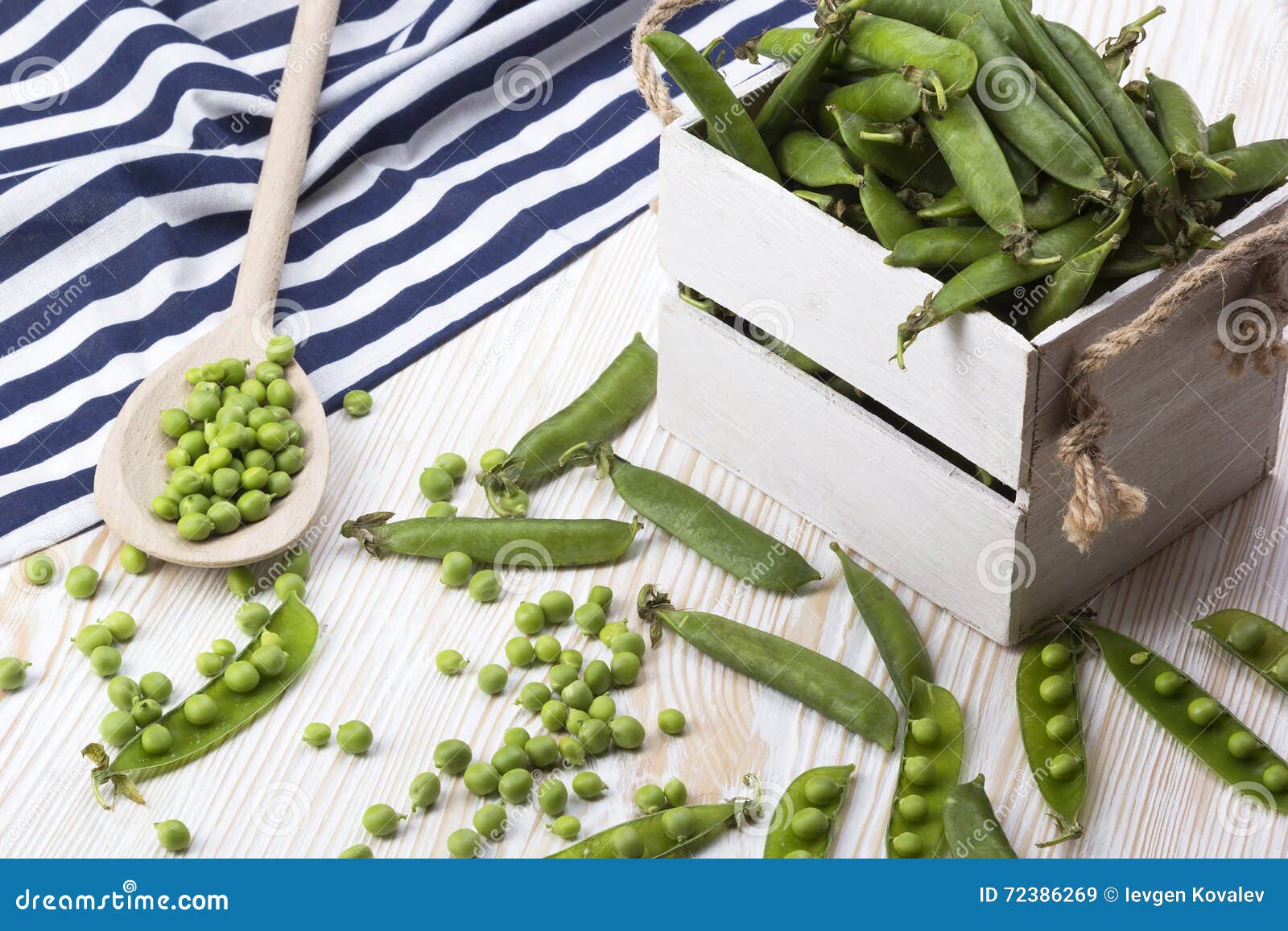 Green peas in a wooden box stock image. Image of ripe - 72386269